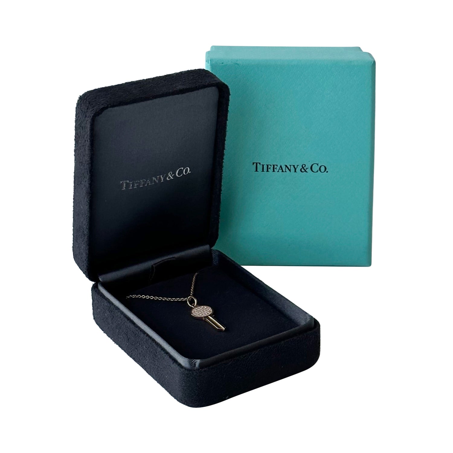 Shop authentic Tiffany & Co. Modern Keys Round Key Pendant Necklace at ...